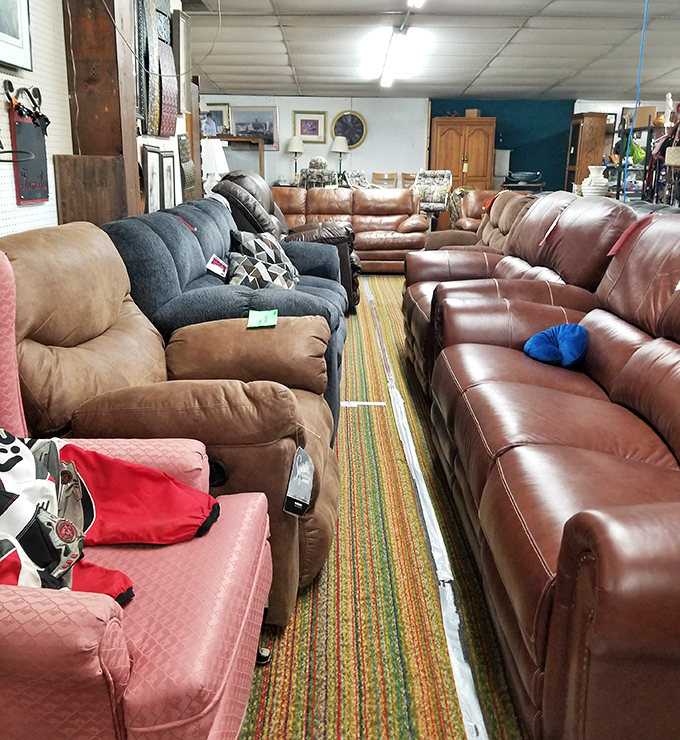 The sofa showdown: leather versus fabric in the ultimate comfort championship. That striped runner has seen more shoppers' deliberations than a fitting room mirror.