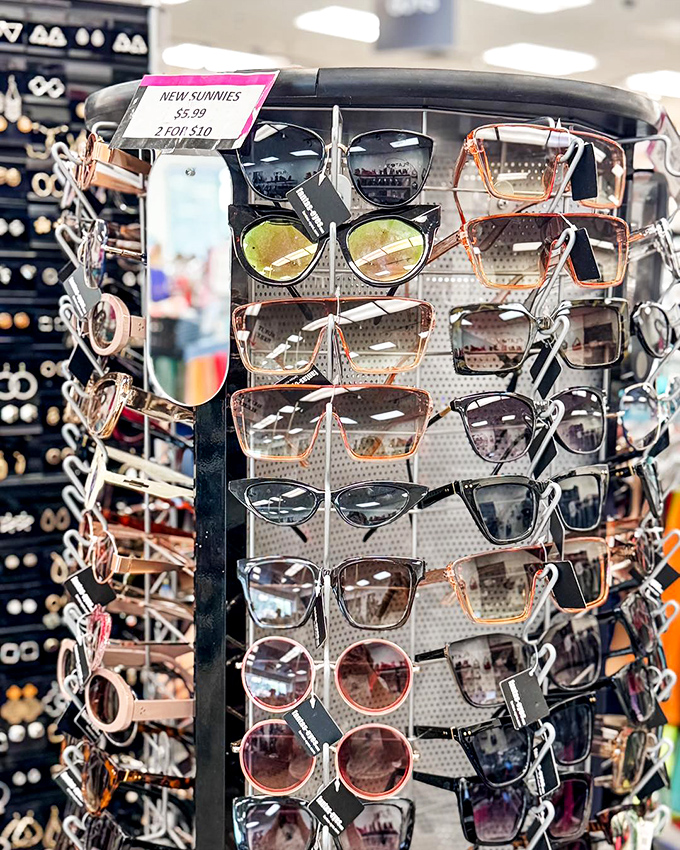 Sunglasses galore! This rotating display of shades offers everything from practical eye protection to "I'm definitely a celebrity incognito" statement pieces.
