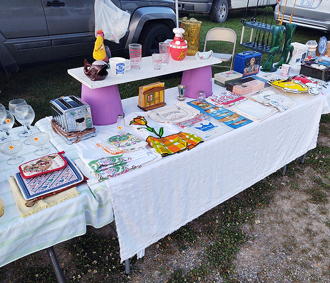 Vintage kitchen linens and collectibles await new homes. That retro toaster has probably made more breakfasts than most restaurants in Detroit.