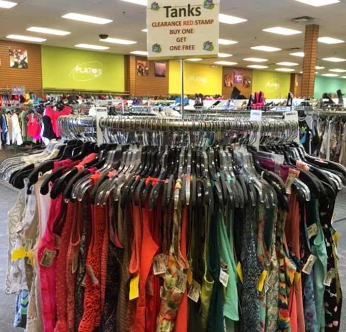 The "Buy One Get One Free" sign might as well say "Double the Dopamine" for bargain hunters navigating this colorful sea of tanks and tops.
