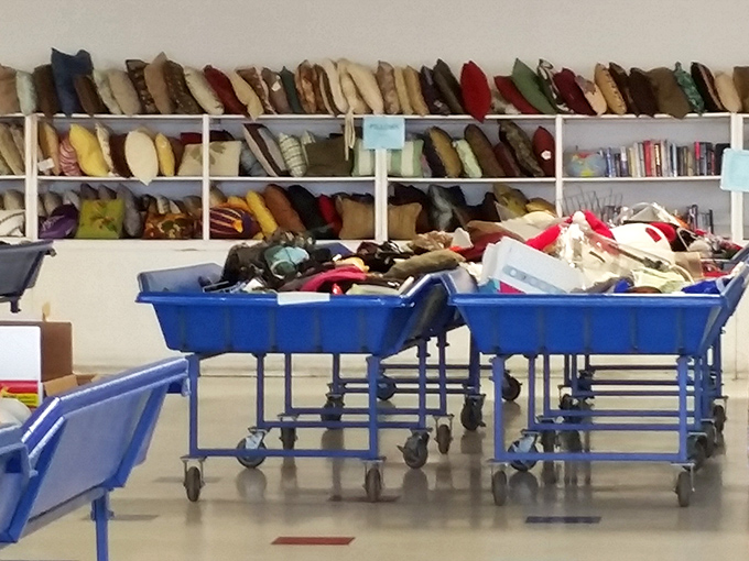 These aren't just bins&mdash;they're portals to possibility. One minute you're sifting through fabric, the next you're holding vintage Pendleton wool that costs less than your morning latte.