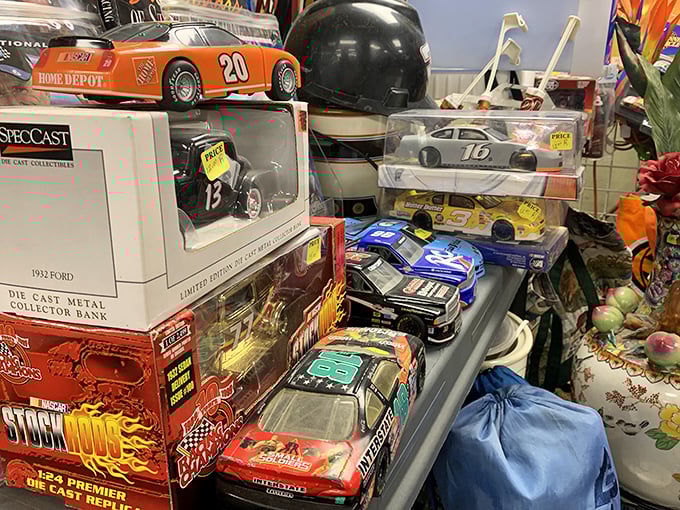 NASCAR dreams in miniature form. Each die-cast car represents someone's childhood memory, carefully preserved behind plastic and cardboard.