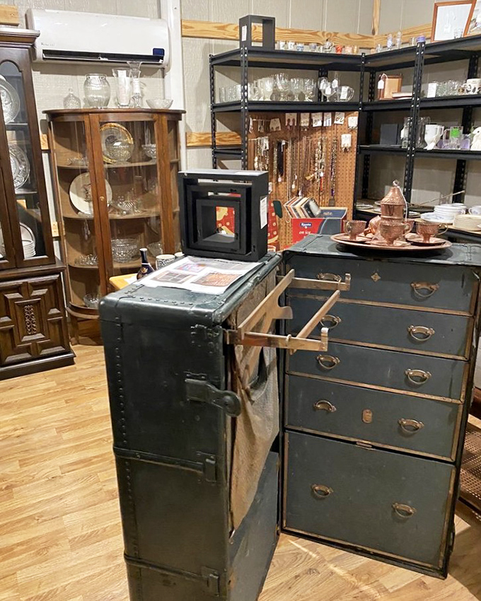 A vintage dresser stands sentinel beside an antique trunk &ndash; furniture that witnessed family dramas and quiet moments long before Netflix existed.