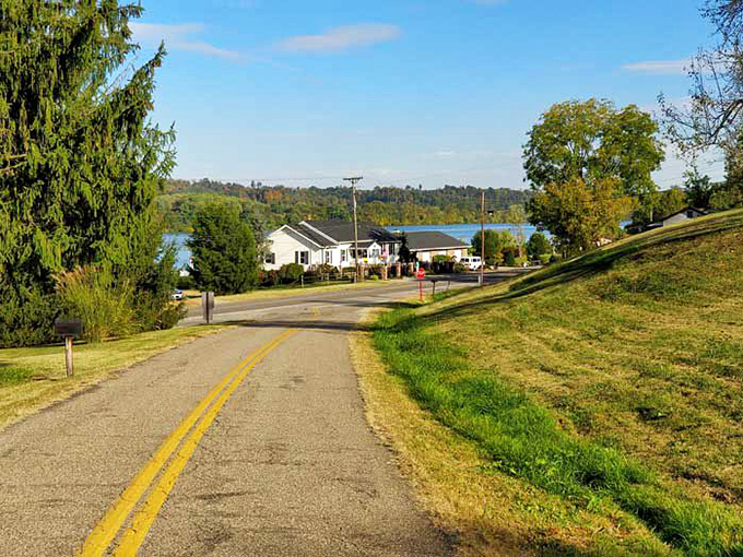 Small-town America unfolds where yellow lines meet blue water. This isn't just a road&mdash;it's a chapter in Ohio's autobiography. 