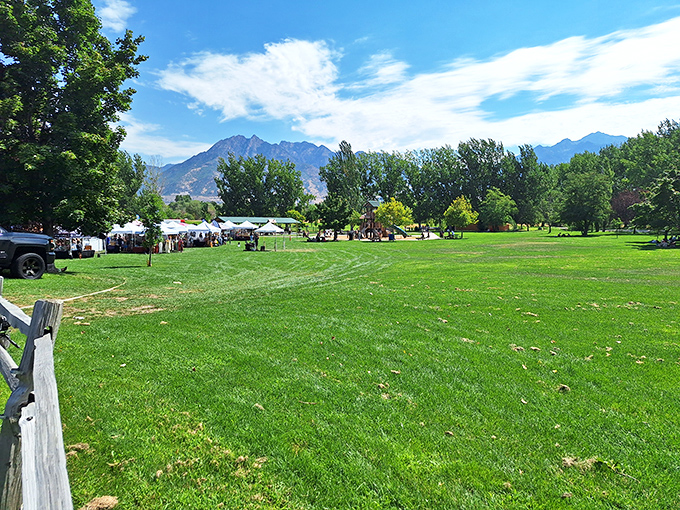 Utah's majestic mountains stand guard over the market, as if nature itself is saying, "Yes, this produce is worth protecting."