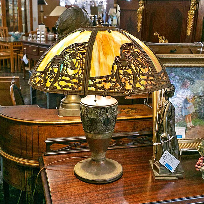This Tiffany-style lamp isn't just lighting—it's functional art history. The amber glow could make even tax paperwork feel romantic.