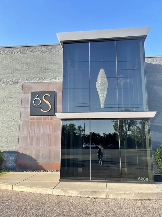 The sleek, modern entrance of 6S Steakhouse promises a contemporary twist on Kansas beef tradition. Glass and steel never looked so appetizing!
