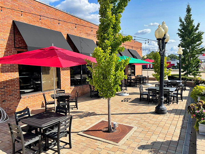 Modern meets timeless on this charming patio where conversations flow as smoothly as the melted cheese.