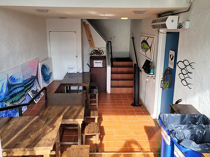 Alii Fish Market's unassuming storefront hides a royal feast of poke inside. The green awning is your gateway to seafood paradise.