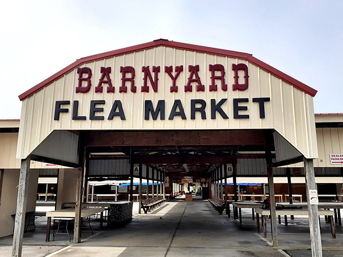 The iconic Barnyard Flea Market entrance promises adventures beyond the threshold. Barn-inspired architecture with treasure-hunting purpose!