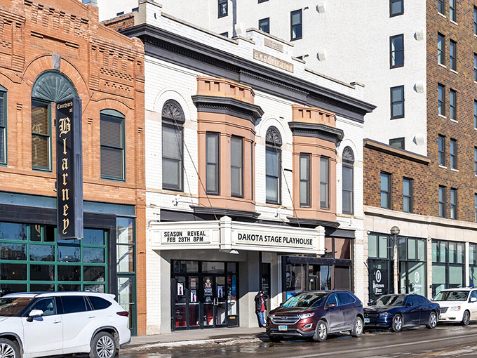 Bismarck's historic Dakota Stage Playhouse stands proudly among neighbors who've witnessed a century of capital city stories.
