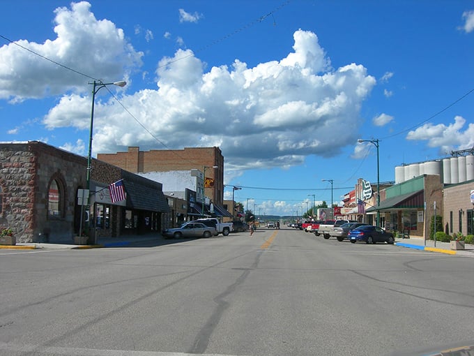 Bottineau's classic main street showcases small-town charm with grain elevators standing guard like prairie sentinels.