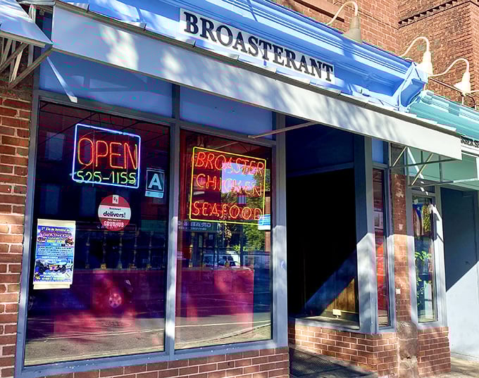 Broasterant's neon glow is like a lighthouse for hungry souls &ndash; signaling that crispy, juicy salvation is just steps away.