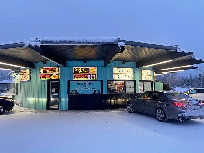 When winter's grip tightens on Fairbanks, this little drive-in becomes a beacon of hope with grills blazing and burgers sizzling.