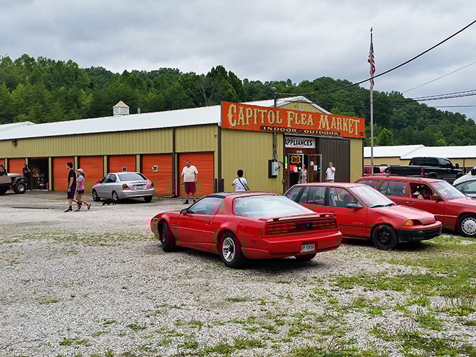 The classic red and yellow Capitol Flea Market sign beckons bargain hunters to explore acres of potential treasures.