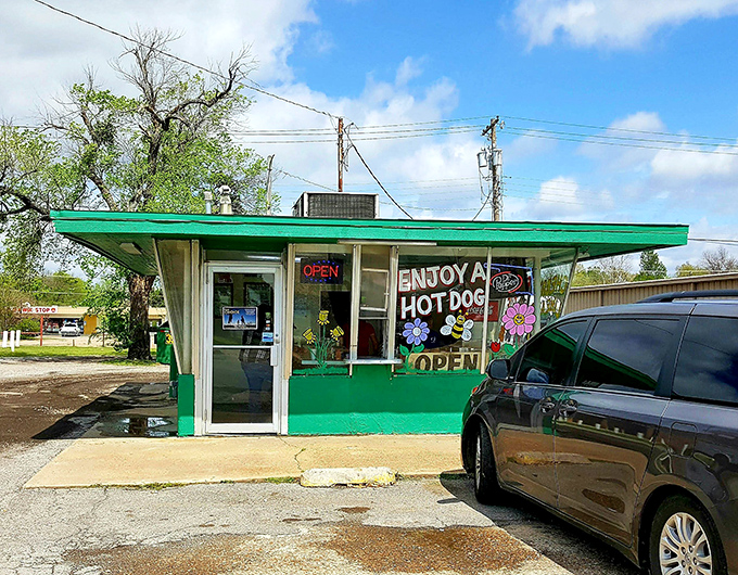Chet's Dairy Freeze's cheerful green exterior is like a beacon for hungry travelers. "Enjoy a HOT DOG" indeed!