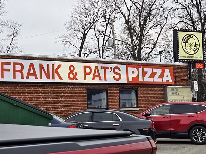 Frank & Pat's bold signage leaves no question about what they do best. Pizza with personality!