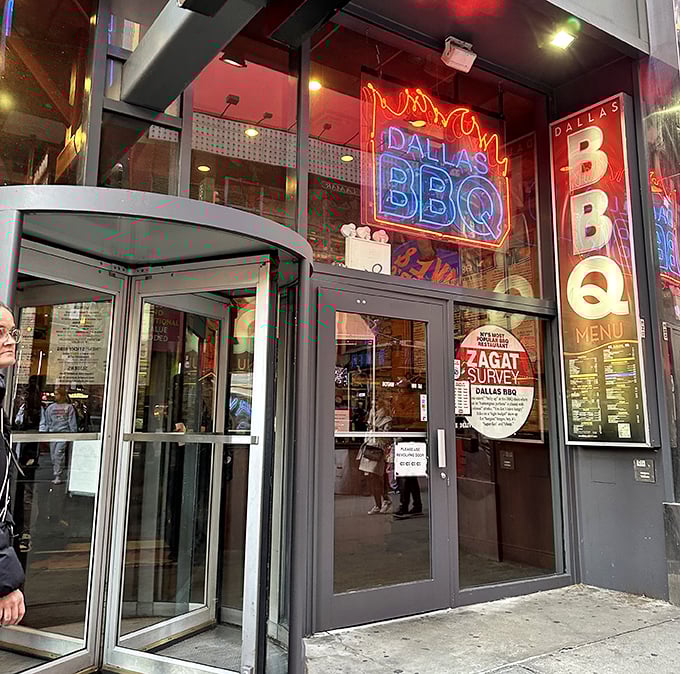 Neon dreams and smoky schemes! Dallas BBQ's glass palace in Times Square serves up Texas-sized portions that'll have your taste buds doing the Broadway shuffle.