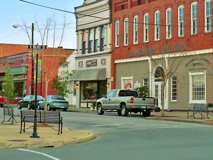 Red brick buildings stand proud, holding decades of stories within their weathered walls. 