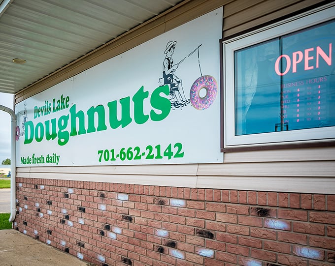 Devil's Lake Donuts' simple exterior belies the heavenly treats inside. Don't let the fishing boy fool you!