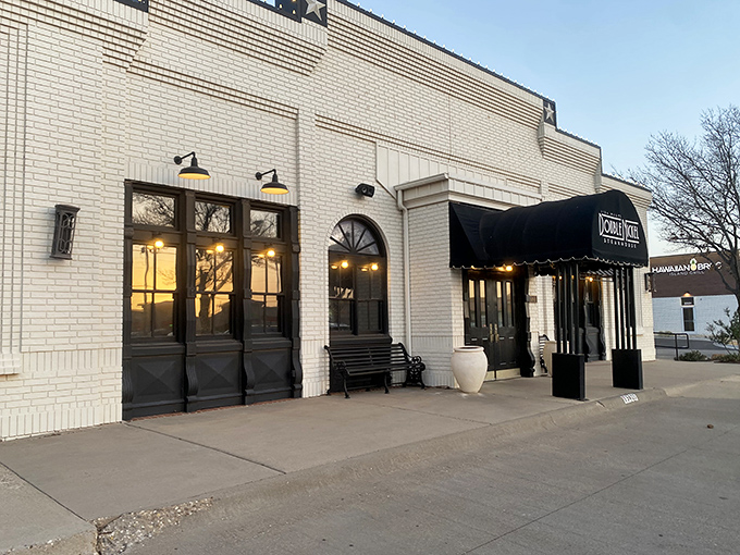 Double Nickel's elegant white brick fa&ccedil;ade whispers class without shouting it&mdash;like finding a tuxedo at a ranch sale.