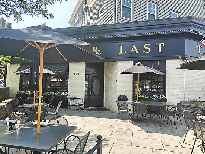First & Last Tavern's patio invites you to linger over one more slice. Those umbrellas have witnessed countless "just one more piece" promises.