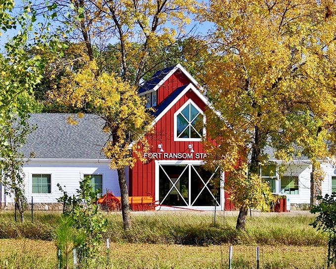 The red barn stands proud against autumn gold, like North Dakota's version of a Hollywood premiere.