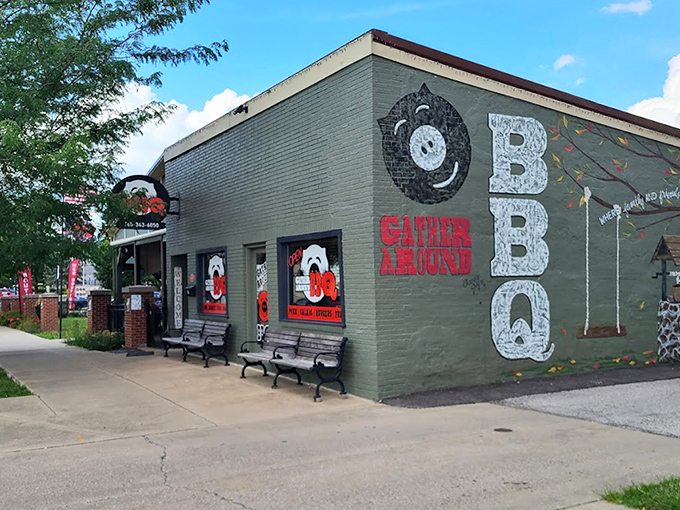 That playful pig logo says it all &ndash; serious BBQ happens here. The green building stands out like a beacon for hungry travelers.