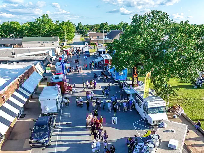 A bird's-eye view of small-town magic! Grove's community food truck gathering brings neighbors together under Oklahoma's big sky, proving good times don't need big price tags.