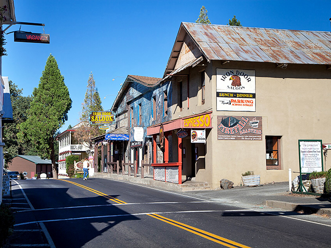 Historic storefronts with wooden facades whisper tales of gold rush days when fortunes changed faster than California weather.