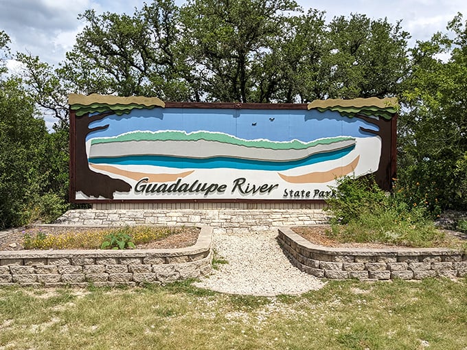 The welcoming sign promises adventures along one of Texas' most beloved waterways.