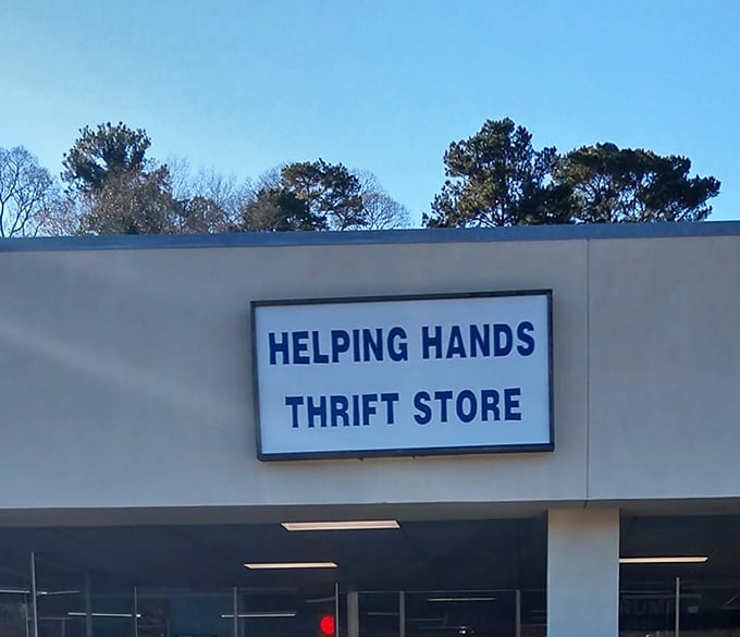 Simple sign, extraordinary finds. Helping Hands proves that the best thrift stores often come in the plainest packages.