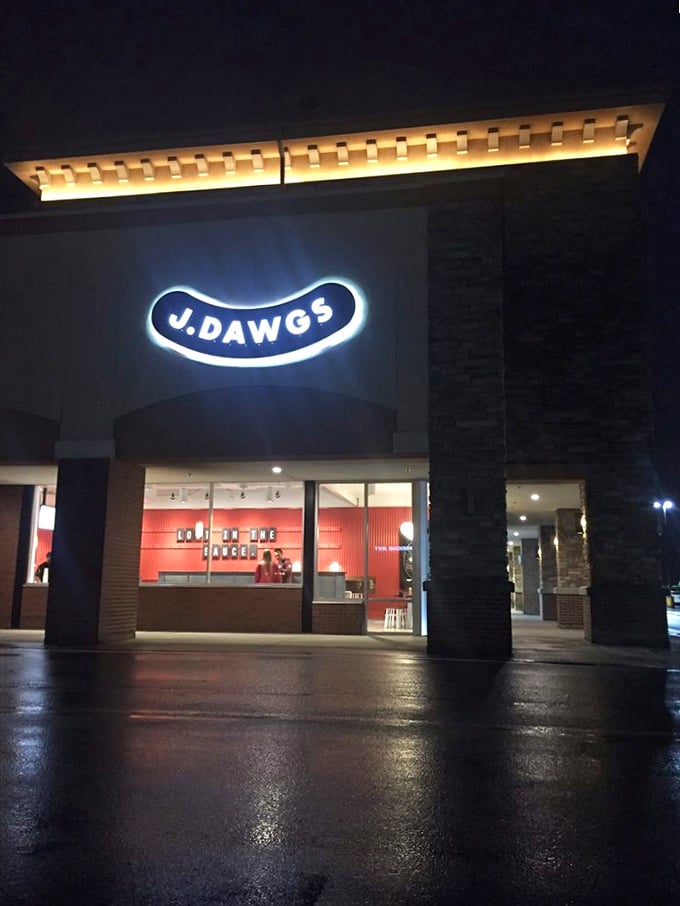 J.Dawgs' glowing sign cuts through the night like a beacon for those lost in a sea of mediocre dinner options.