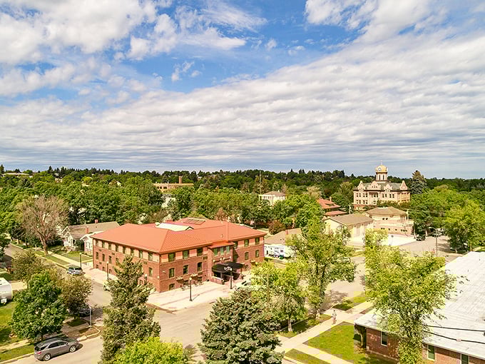 Lewistown's aerial view reveals a prairie oasis where neighborhoods bloom like carefully tended gardens in endless grassland.