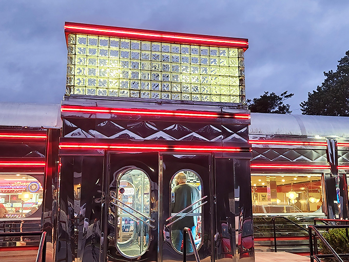 The evening lights transform this retro gem into a glowing treasure chest of comfort food possibilities.