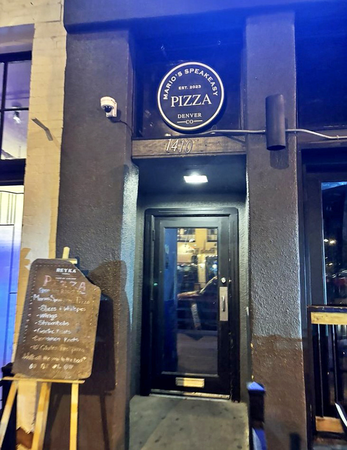 Mario's Speakeasy Pizza channels prohibition-era mystery with its understated entrance. Password: "I'm here for the pizza."