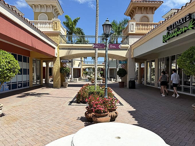 Miromar Outlets offers breezy, sunlit walkways where colorful flowers and palm trees make shopping feel like vacation.