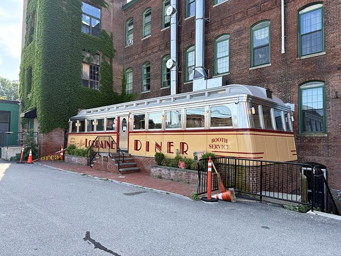 Miss Lorraine Diner gleams like a time capsule on wheels, nestled against brick buildings that have seen generations come and go.