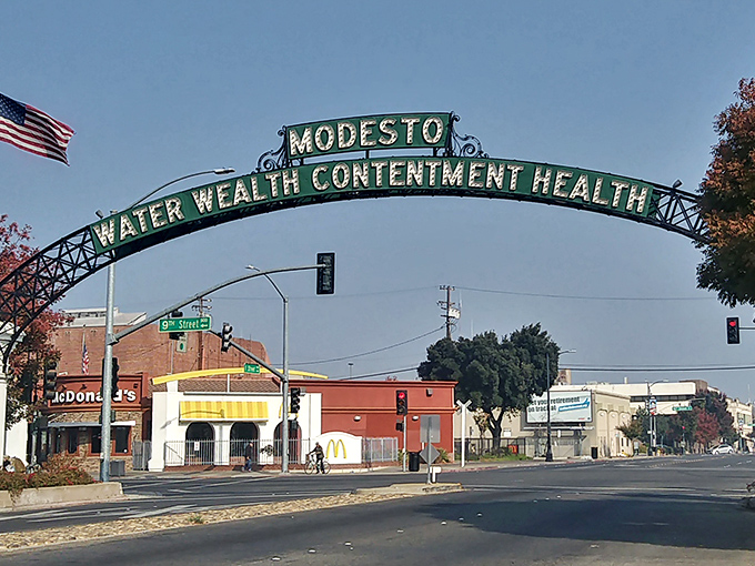 "Water, Wealth, Contentment, Health" - Modesto's famous arch spans downtown like a welcoming embrace. The city motto that says it all!