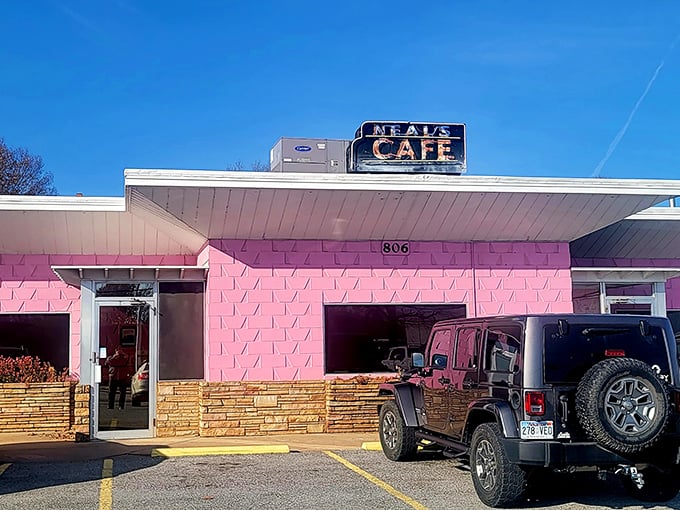 Neal's Cafe Pink as a perfect sunset, Neal's Cafe stands out like a flamingo in a flock of pigeons.