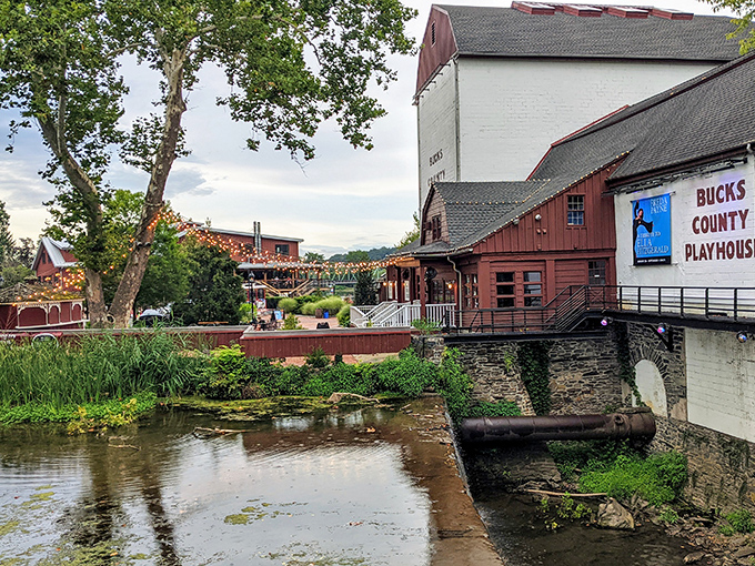 New Hope's vibrant main street welcomes visitors with its distinctive red brick buildings. Hanging plants and patriotic bunting add to the town's already considerable charm.