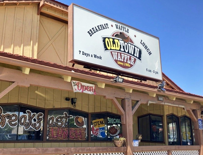 The rustic wood exterior whispers secrets of pancakes that could change your morning routine.