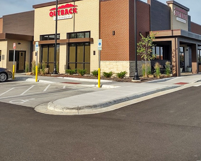 Outback Steakhouse Centerville breaks the chain restaurant mold. This modern brick exterior houses steak wizards who know their craft.