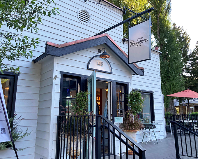 Persephone's charming cottage exterior looks like it was plucked straight from a fairy tale cookbook.