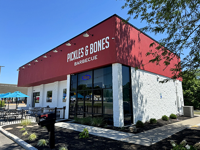 Pickles & Bones' bold red building stands out like a delicious warning: "Prepare for flavor overload ahead!"