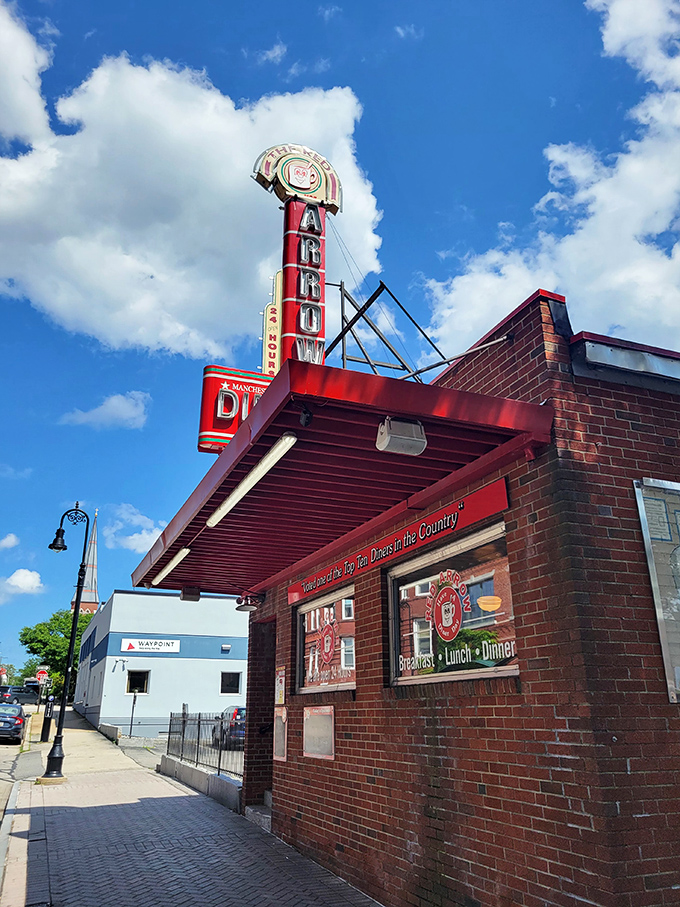 Red Arrow Diner's classic signage stands tall like a beacon for anyone seeking authentic American breakfast comfort. 