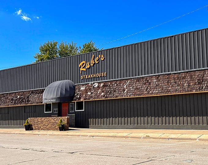 That golden script against dark metal looks like a vintage marquee announcing tonight's star: your perfectly cooked steak.