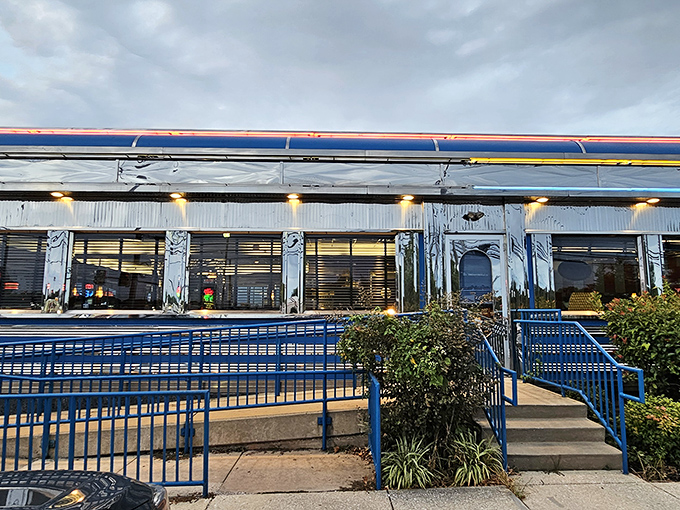Silver Moon Diner shines like polished chrome against the sky. A temple to eggs, bacon, and bottomless coffee.