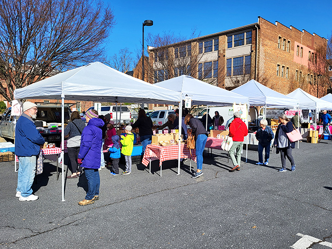 White tents and red checkered tablecloths—the universal signal that good things await at this charming farmers' market.