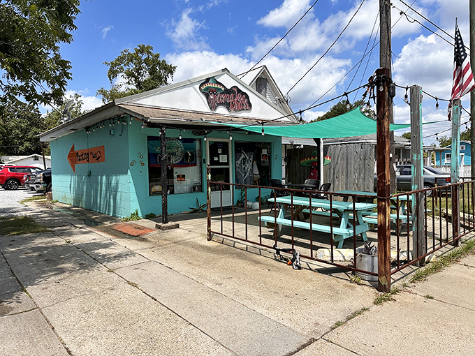 The Tamale Shak's turquoise exterior is as refreshing as finding authentic tamales near the Gulf. Beach vibes meet Delta tradition in this colorful hideaway.